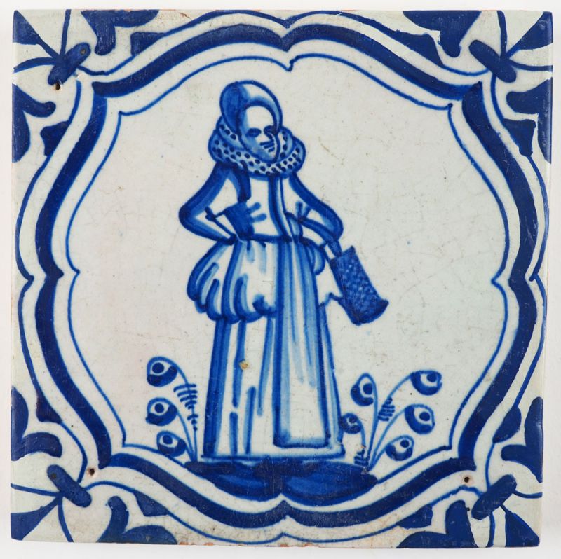 Antique Delft tile with a lady, 17th century