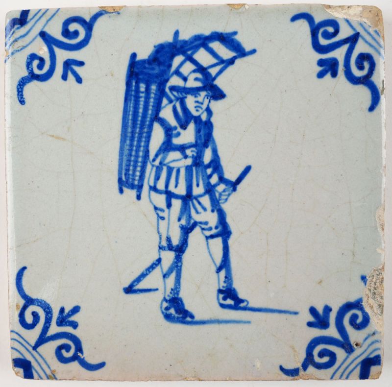 Antique Delft tile with a peddler, 17th century