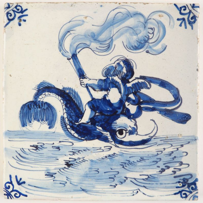 Antique Delft tile with Cupid on top of a dolphin, 17th century