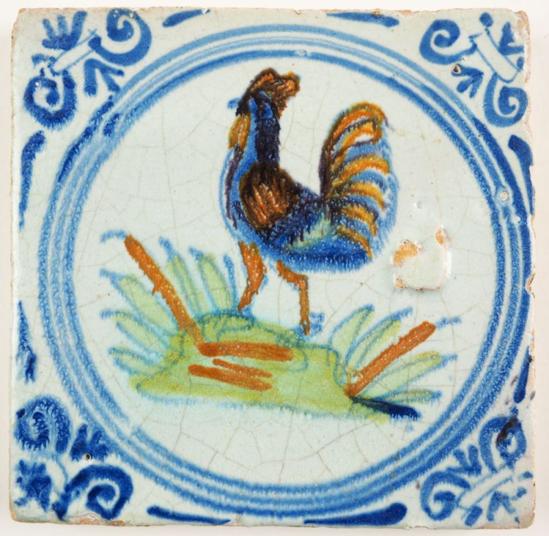 Antique Delft tile with a rooster, 17th century