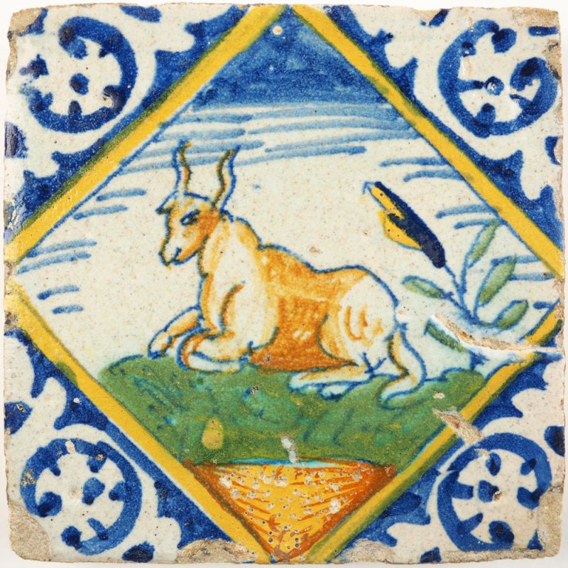 Antique Delft tile with a cow, 17th century