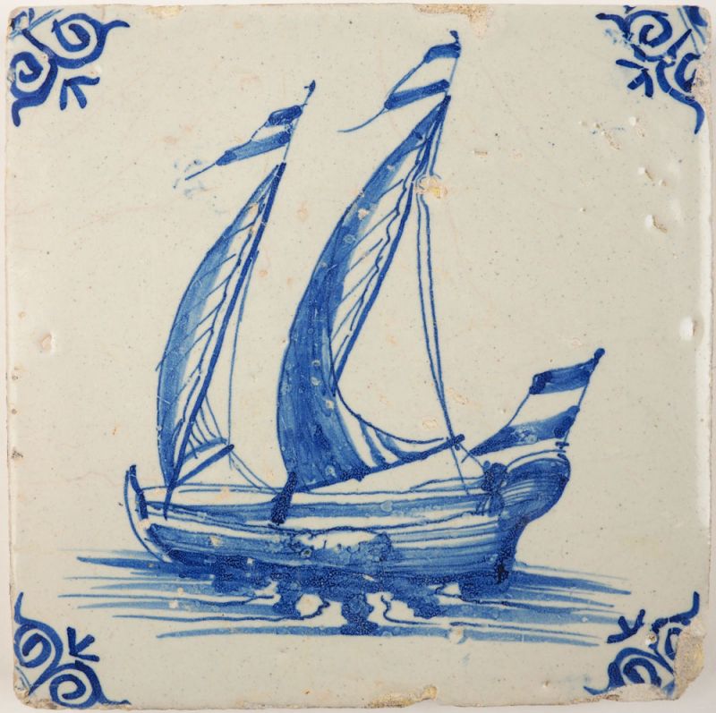 Antique Delft tile with a cargo boat, 17th century