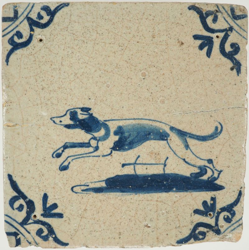 Antique Delft tile with a dog, 17th century