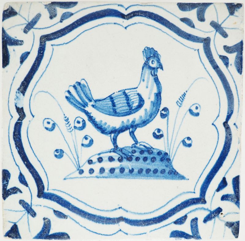 Antique Delft tile with a rooster, 17th century