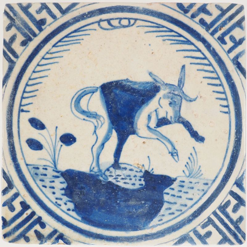 Antique Delft tile with a bull, 17th century