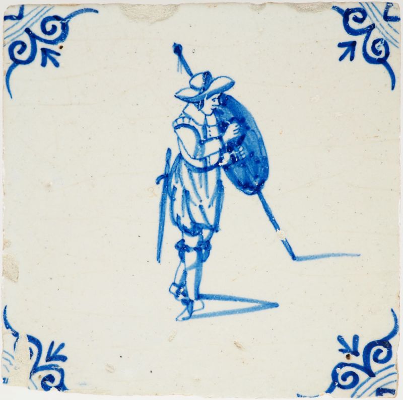Antique Delft tile depicting a soldier with a shield, 17th century