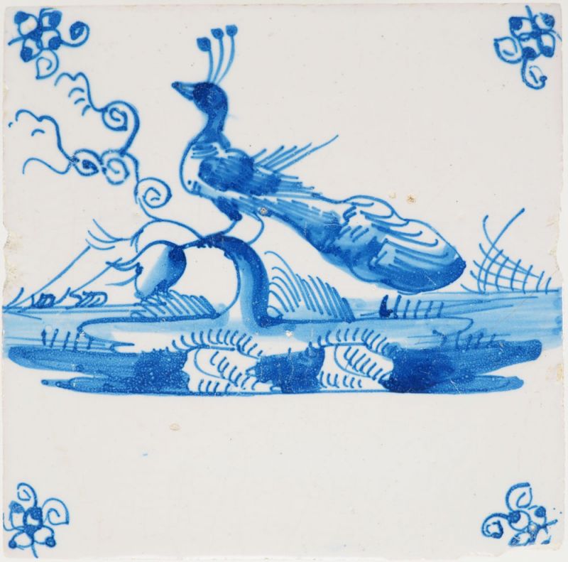 Antique Delft tile with a peacock, 17th century