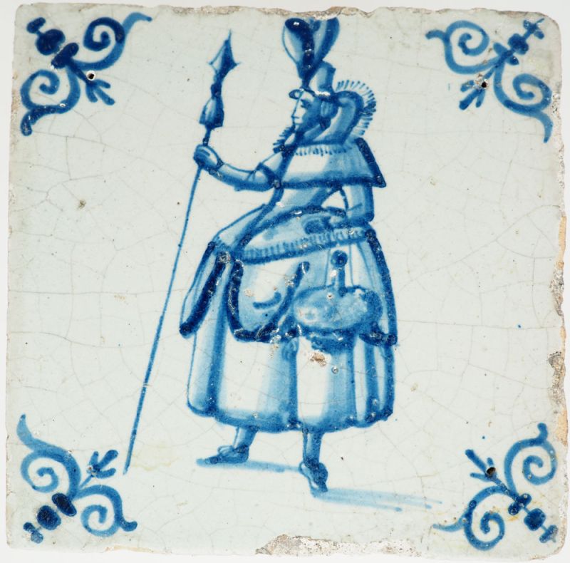 Antique Delft tile with a sutler, 17th century