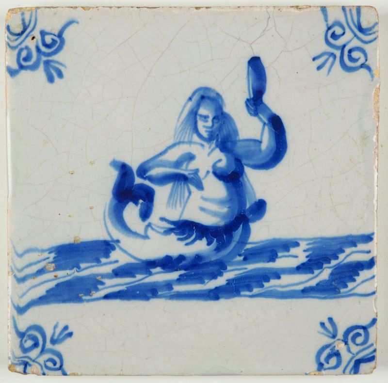 Antique Delft tile depicting a mermaid admiring herself in the mirror ...