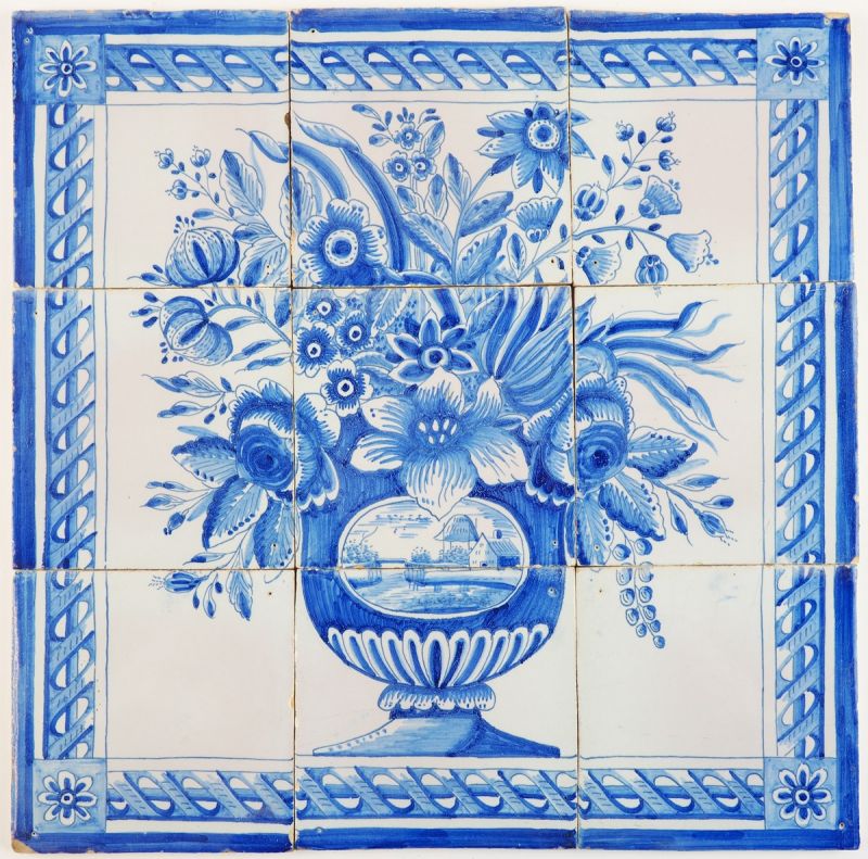 Antique Delft tile mural in blue with a richly decorated flower vase on ...