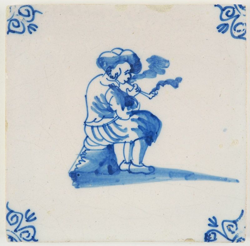 Antique Delft tile with a man smoking a tobacco pipe, 18th century