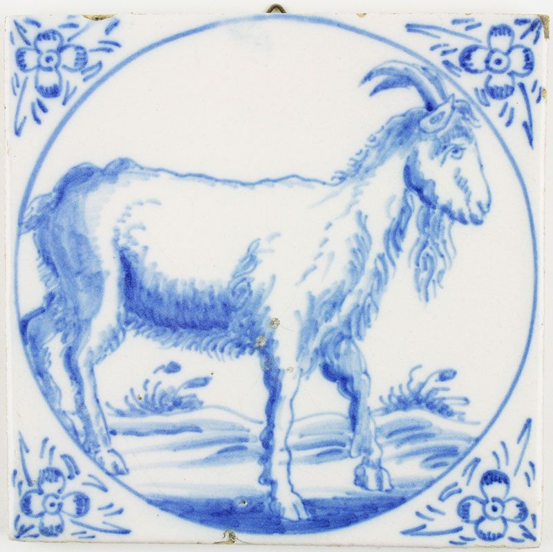 Antique Dutch Delft tile in blue with a goat, 19th century