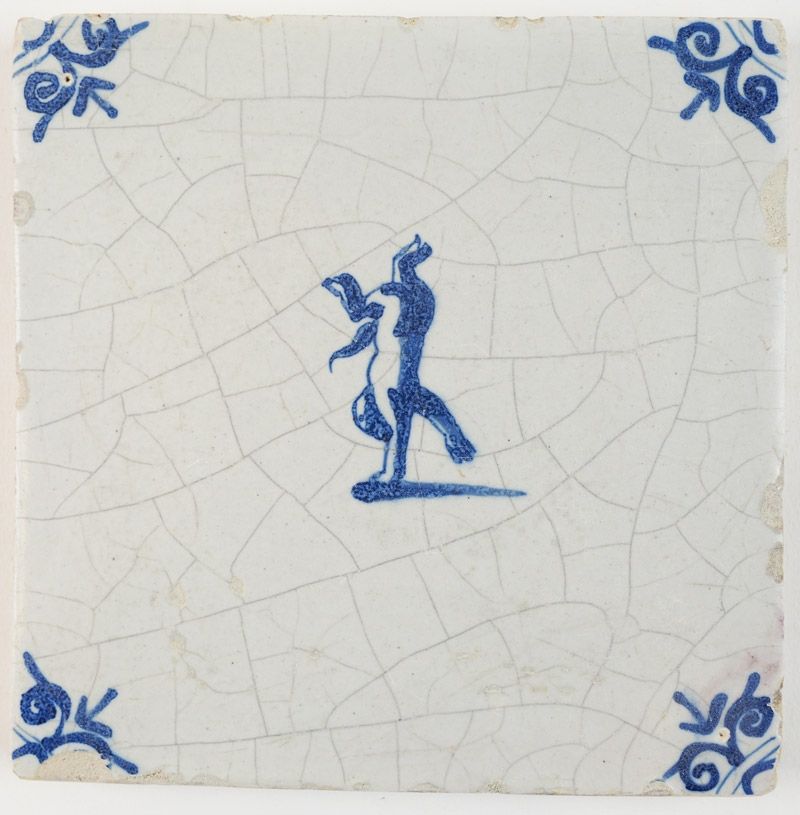 Antique Delft tile with a monkey walking on his front paws, 17th century
