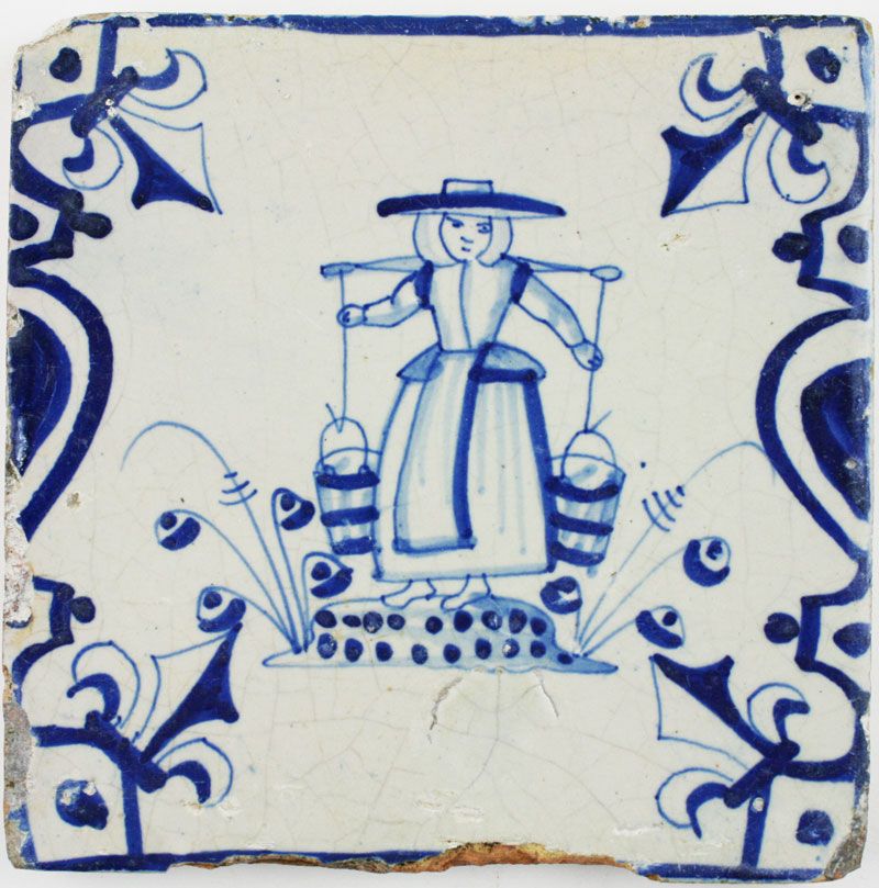 Antique Dutch Delft tile in blue with a woman carrying a yoke with two ...