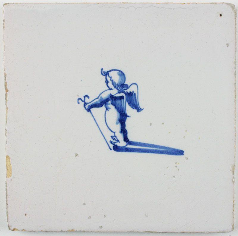 Antique Delft tile with Cupid leaning on a stick, 17th century
