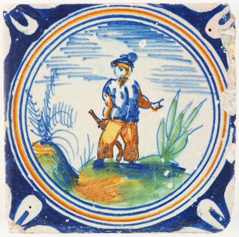 Antique Delft polychrome circle-cord tile with a figure swinging a club ...
