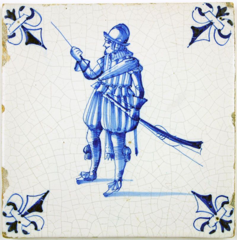 Delft tile depicting a soldier preparing his rifle, 17th century
