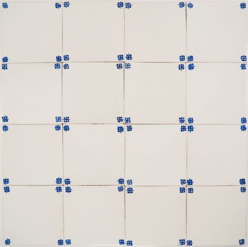 Antique Delft wall tiles with spider corner motifs, 19th - 20th century