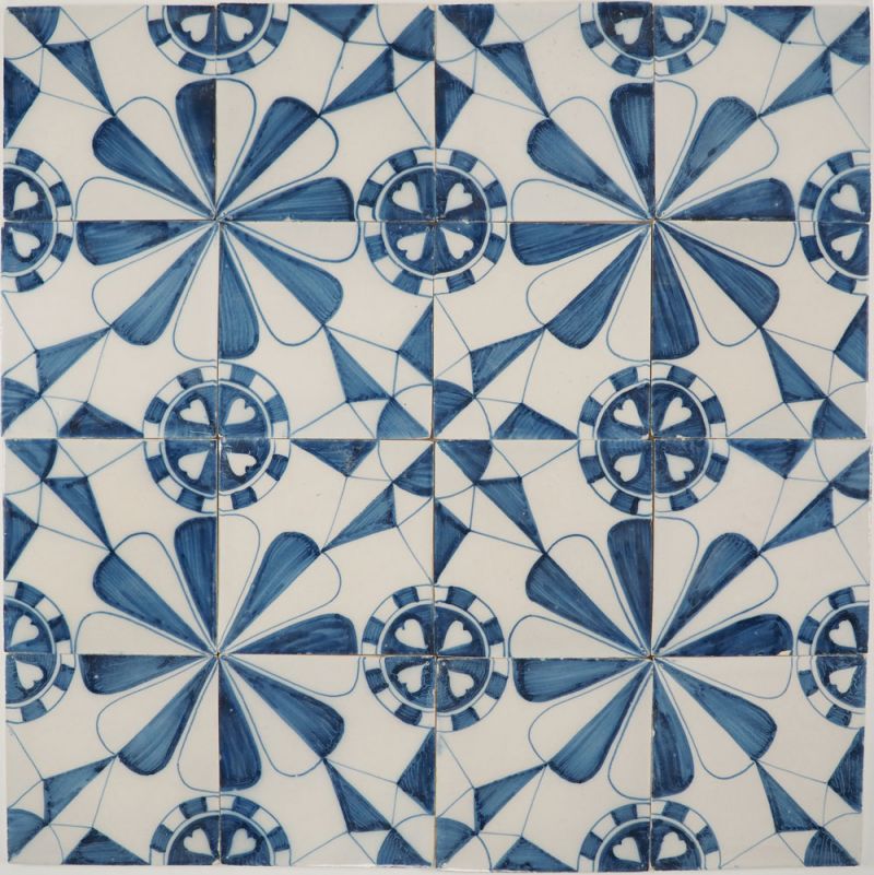 Antique Dutch Delft ornamental wall tiles in blue with stars, 19th century